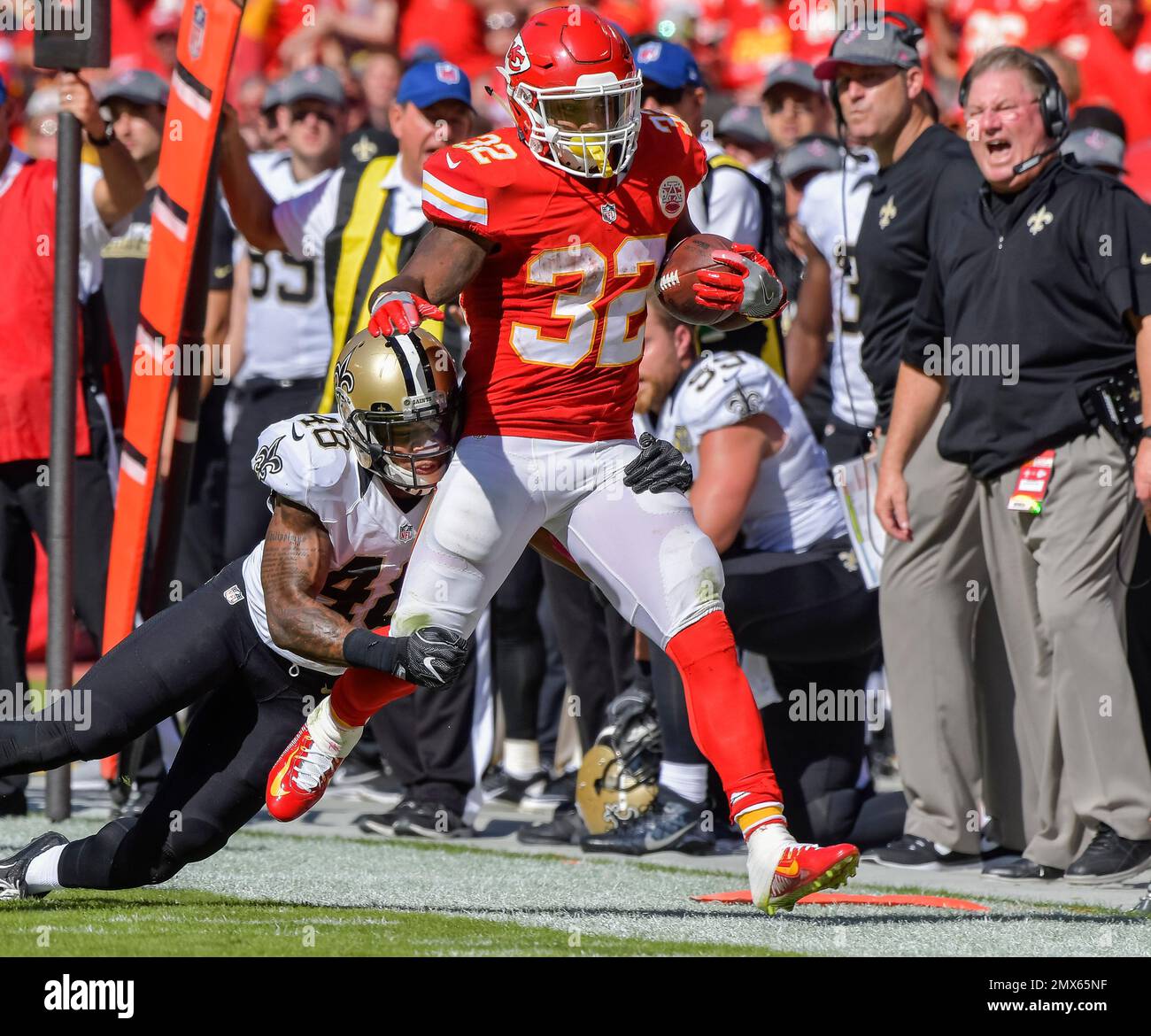Kansas City Chiefs running back Spencer Ware (32) is tackled by New ...