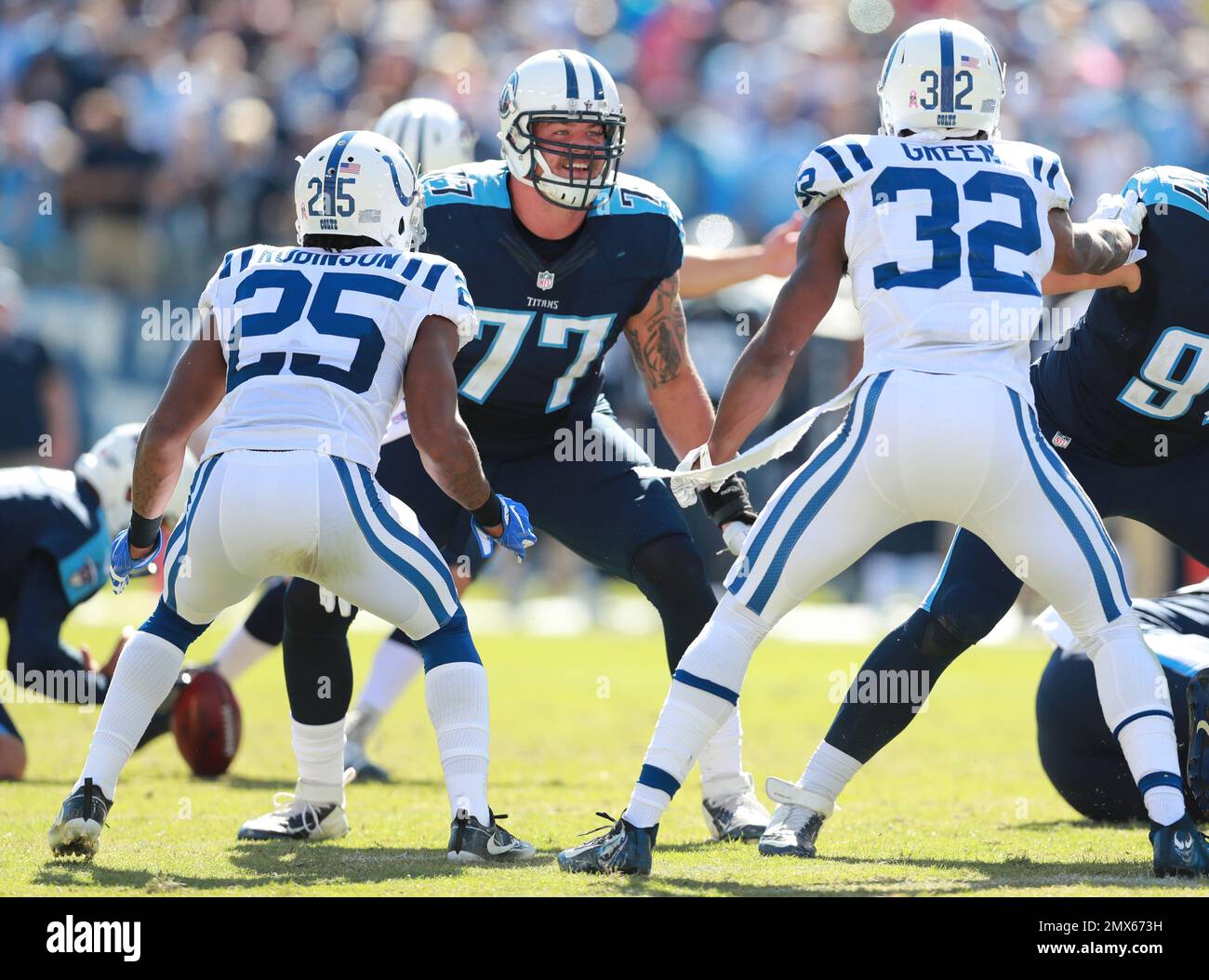 Tennessee Titans tackle Taylor Lewan (77) sets to block against the ...