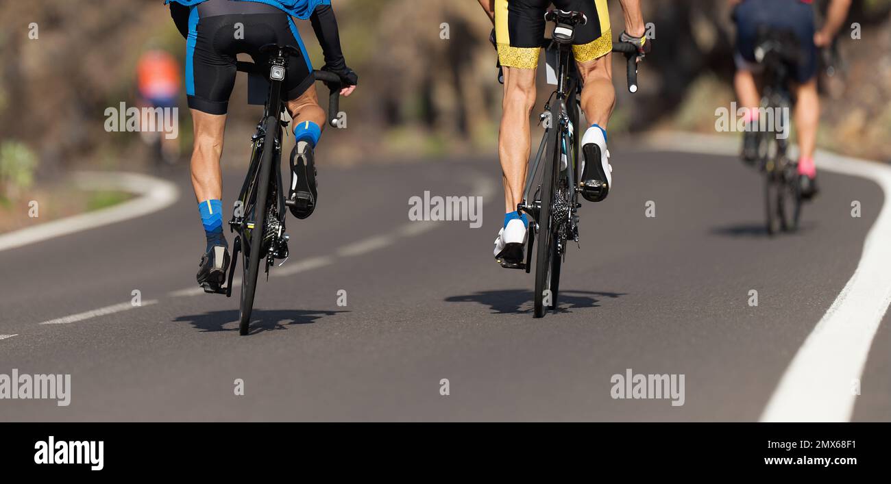 Cycling competition cyclist athletes riding a race at high speed ...