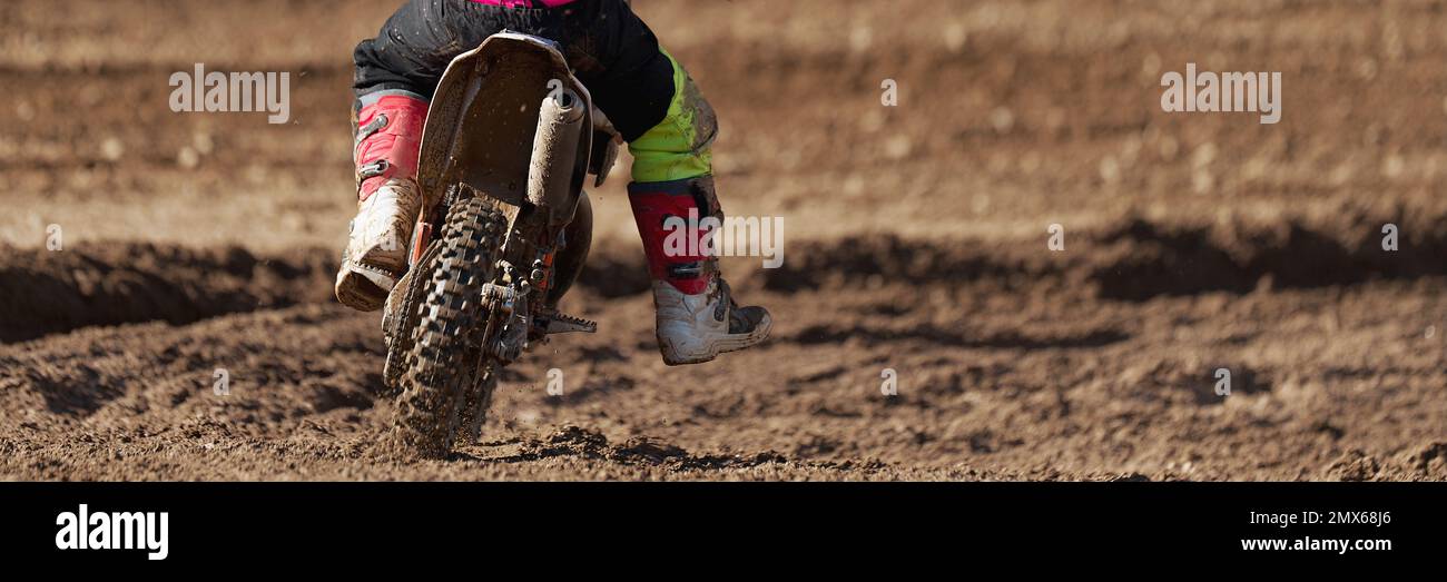 Racer child on motorcycle participates in motocross race, active ...