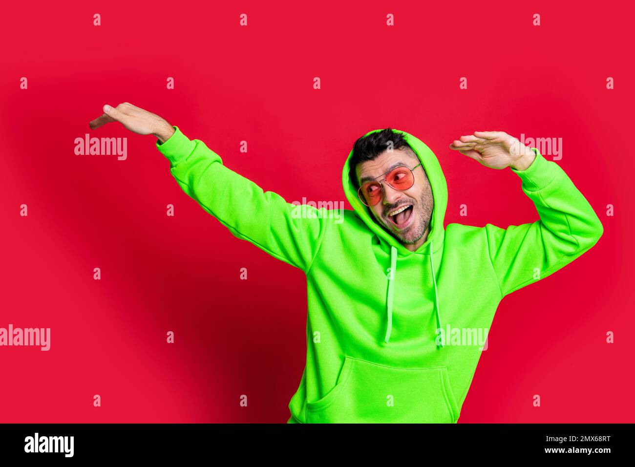 Dancing man isolated on red. Funky man dancing studio. Hip hop dancing ...