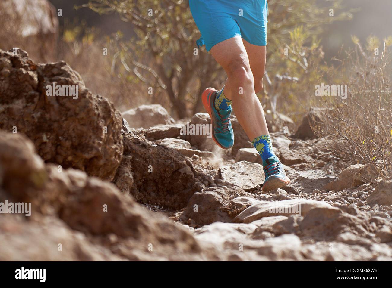 Trail running action close up of running shoes in action Stock Photo ...