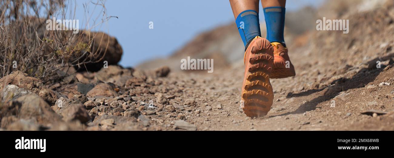 Trail running action close up of running shoes in action Stock Photo ...
