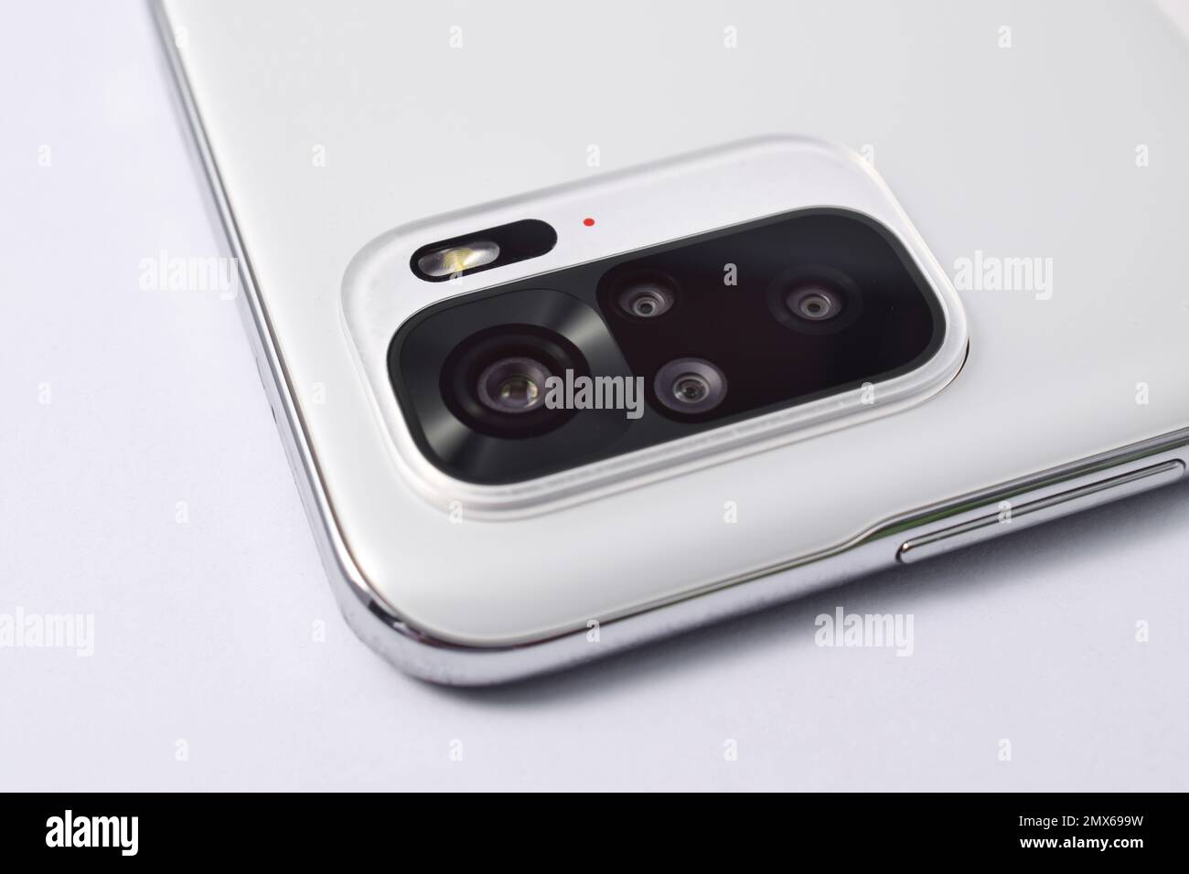Smartphone quad camera module. New modern white smartphone with quad ...