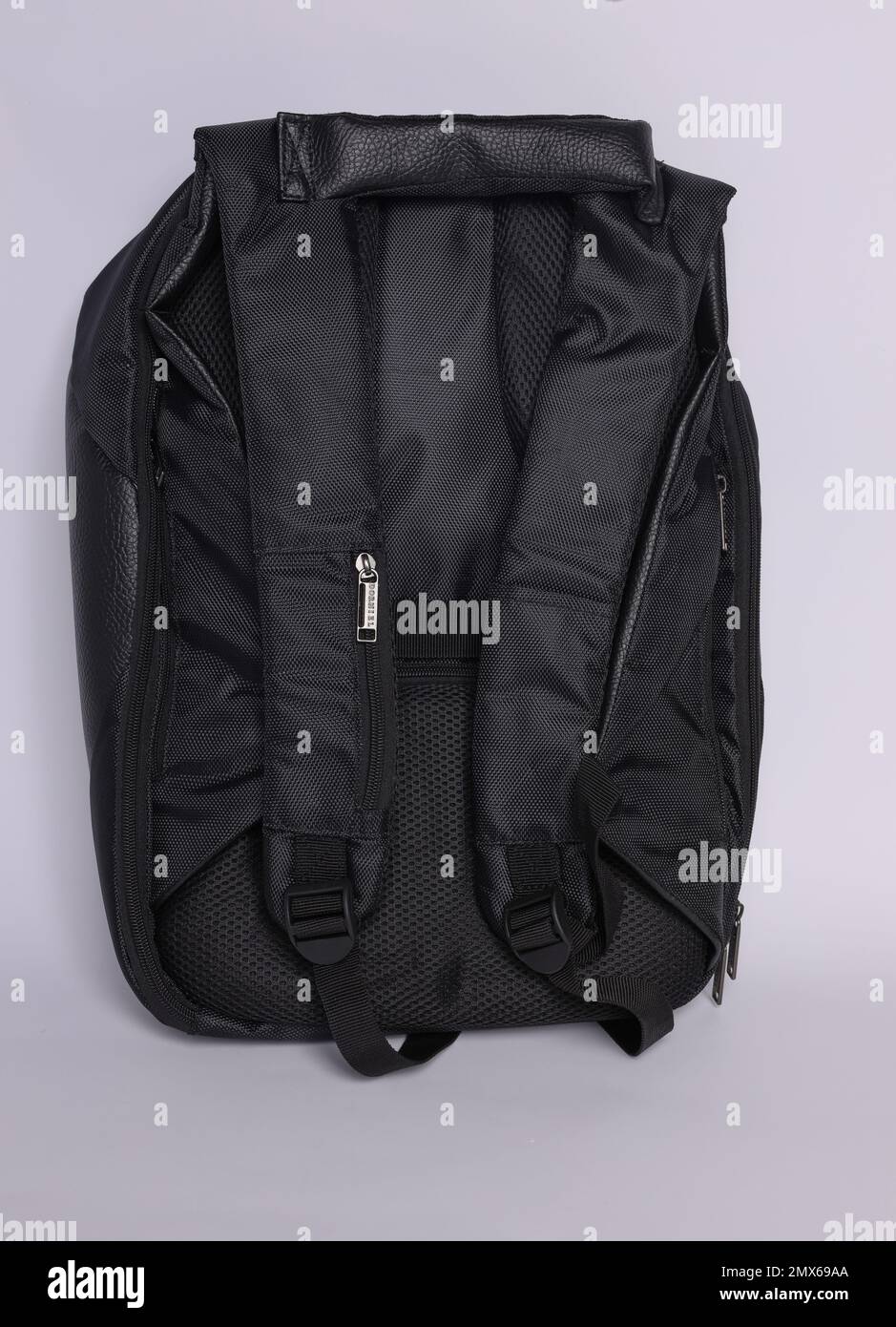 Black color ether travelling bag back side view isolated white ...
