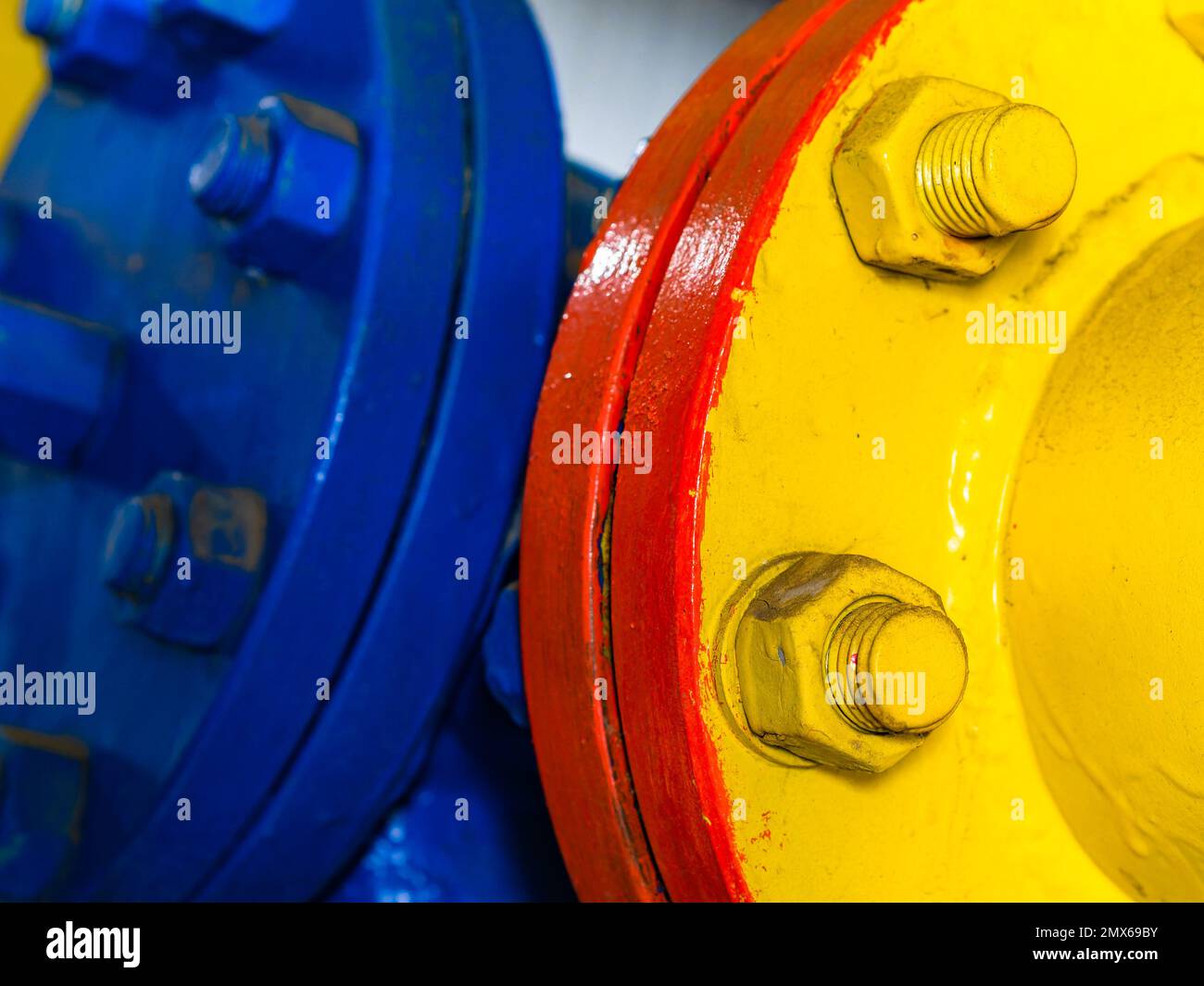 Close-up view of metal pipe connections. Industrial painting of metal ...