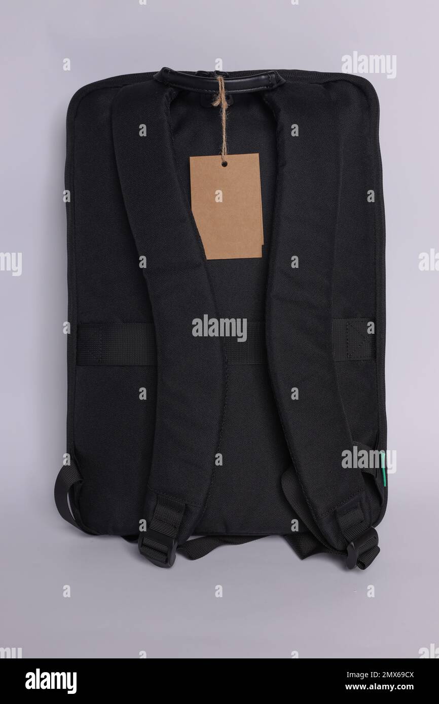 Black color travelling bag back side view isolated white background ...