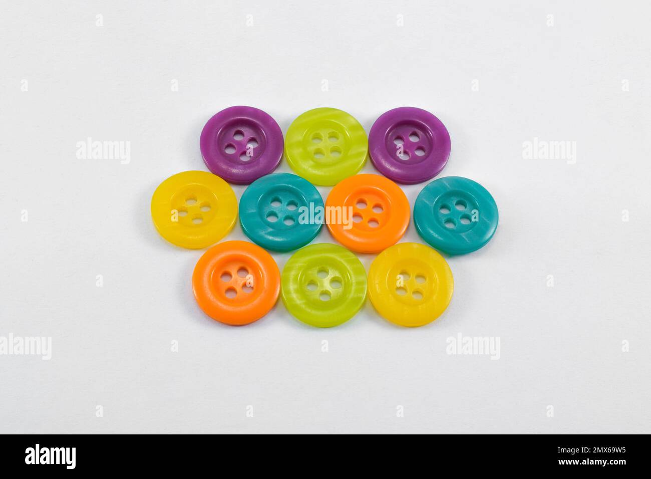 Collection of color buttons for clothes isolated on white background ...