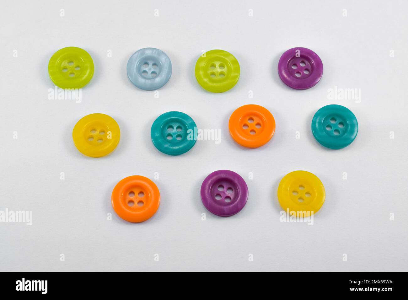 Collection of color buttons for clothes isolated on white background ...