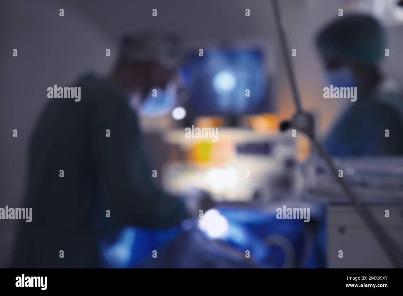 Professional team doctors during operation hi-res stock photography and ...