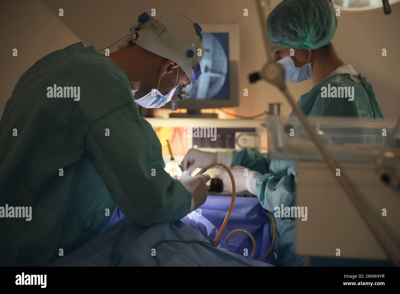 Performing operation hi-res stock photography and images - Alamy