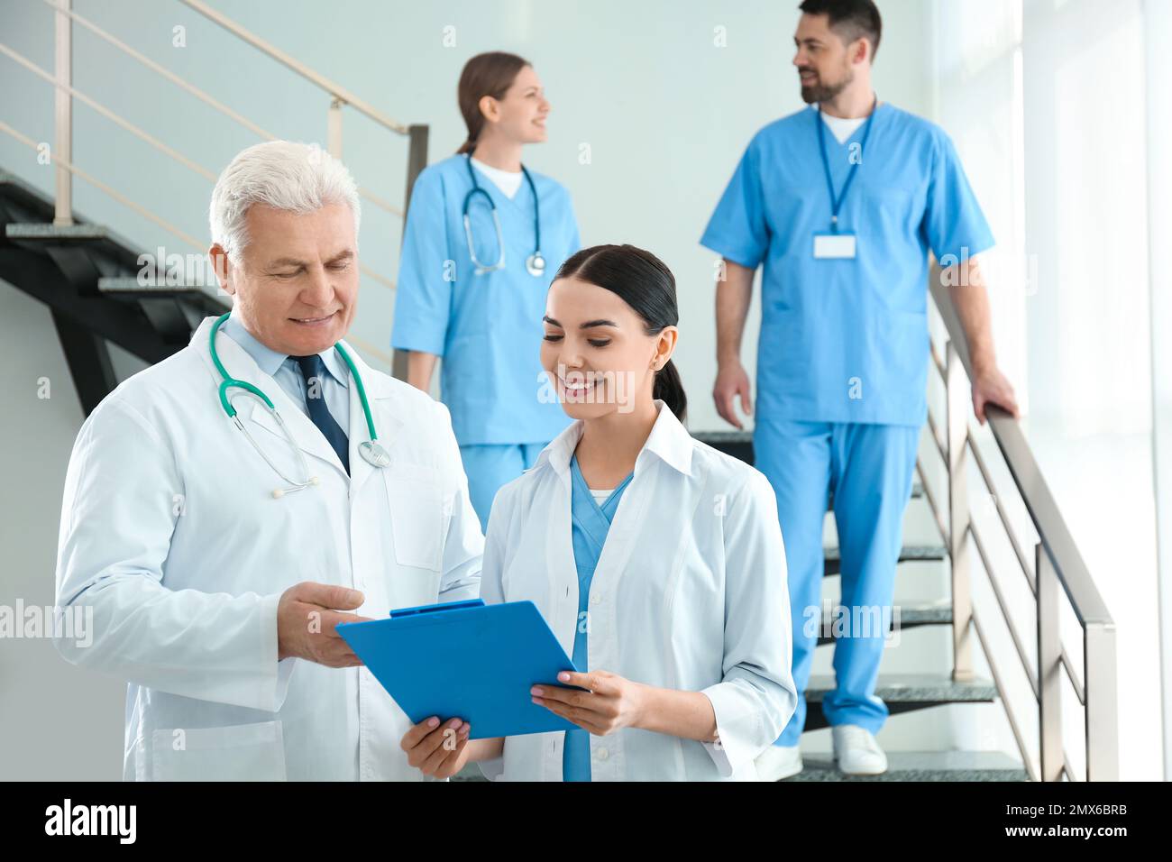 Group of doctors in clinic. Medical service Stock Photo - Alamy