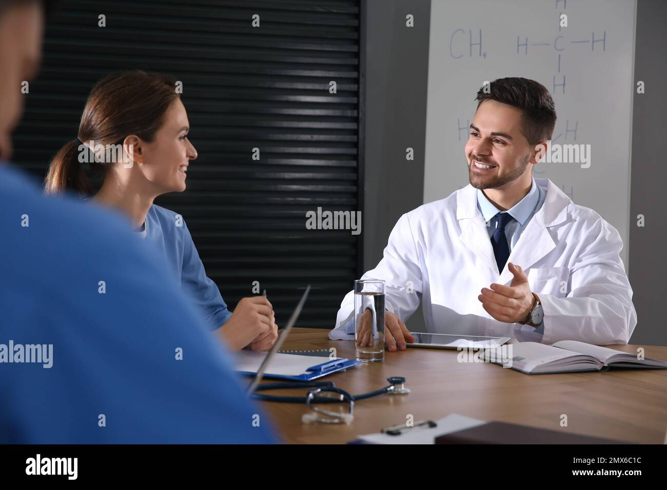 Group happy doctors meeting hi-res stock photography and images - Alamy