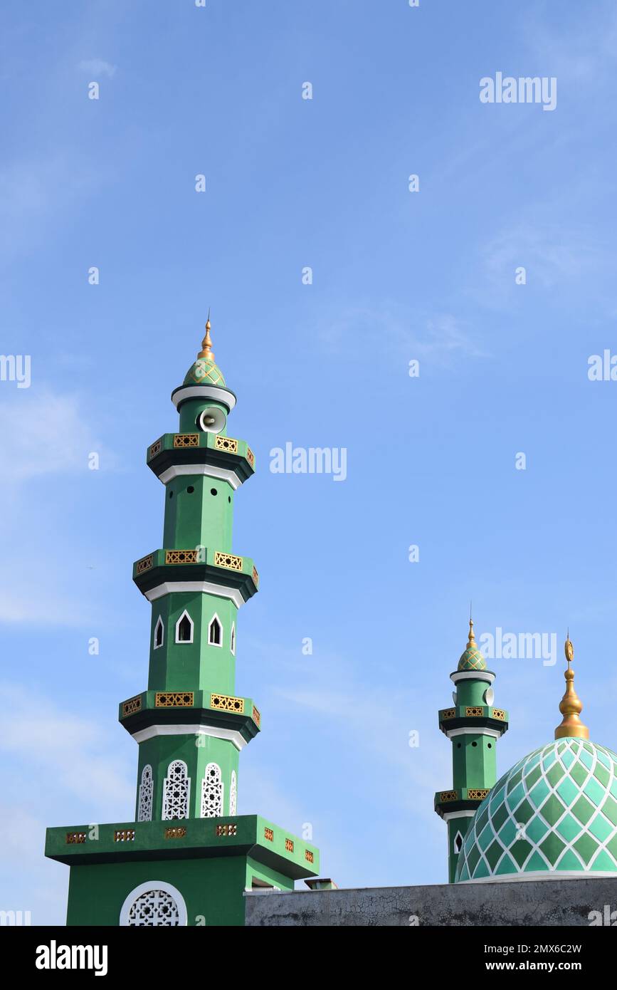 Muslim Mosque. Domes and towers. with a blue sky background, Indonesian ...
