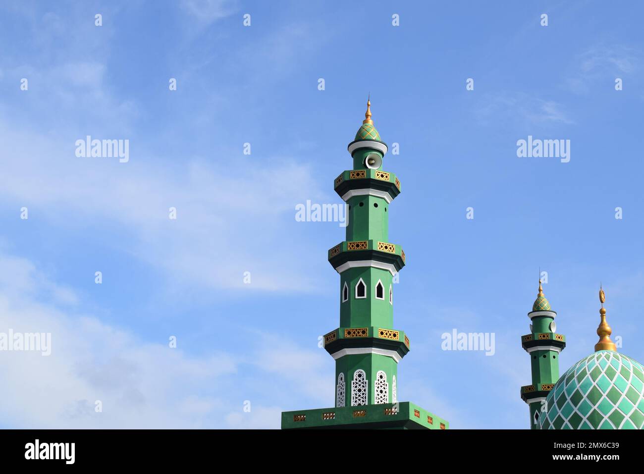 Muslim Mosque. Domes and towers. with a blue sky background, Indonesian ...