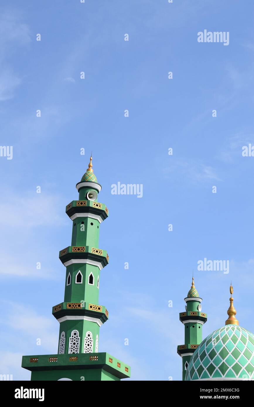 Muslim Mosque. Domes and towers. with a blue sky background, Indonesian ...