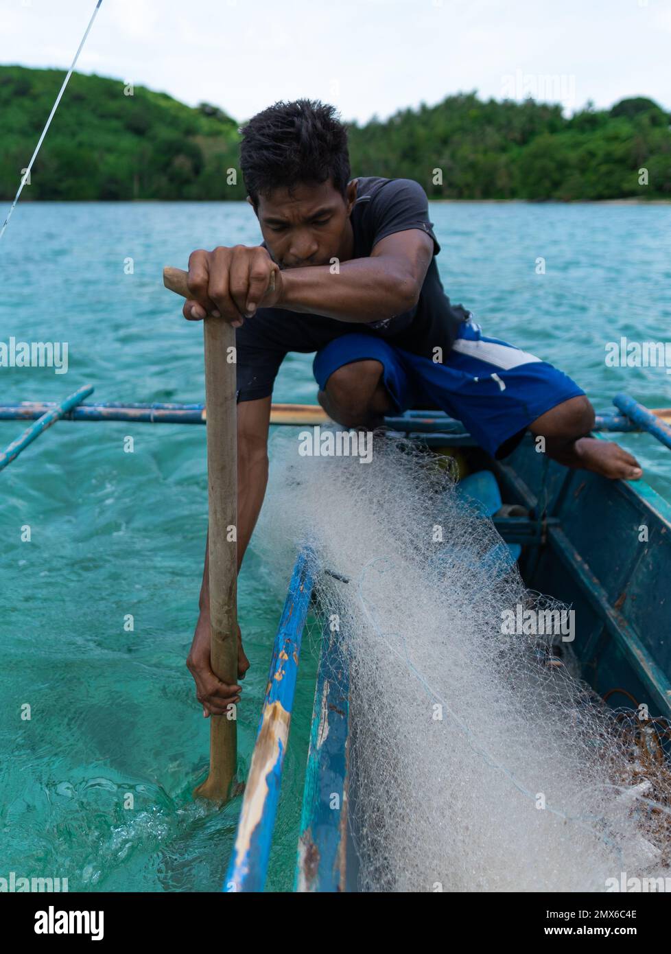 Filipino Fisherman With A Lamp Filipino Fisherman Photos, Images
