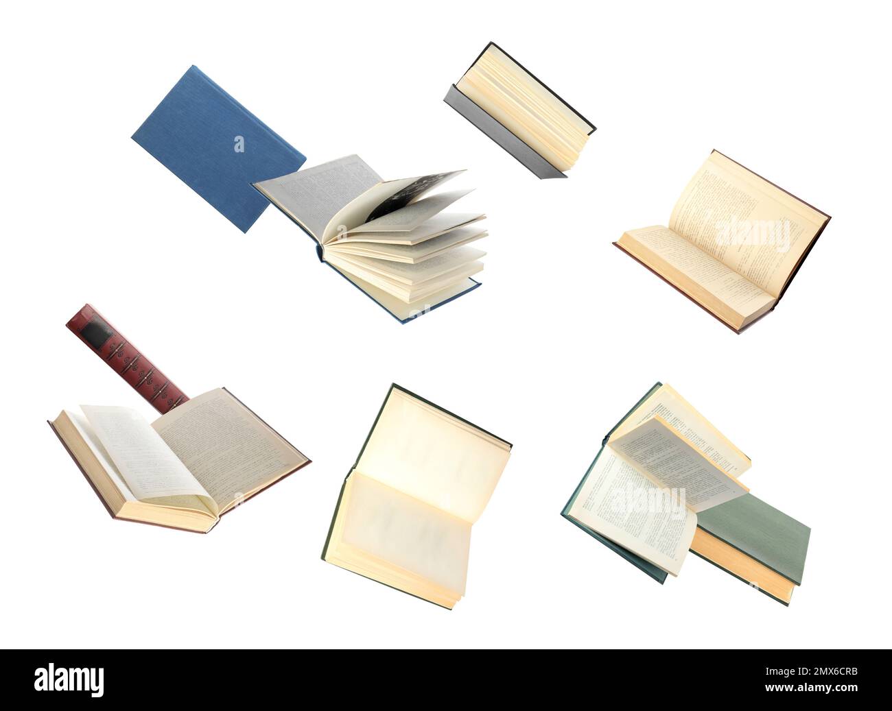 Old hardcover books flying on white background Stock Photo - Alamy