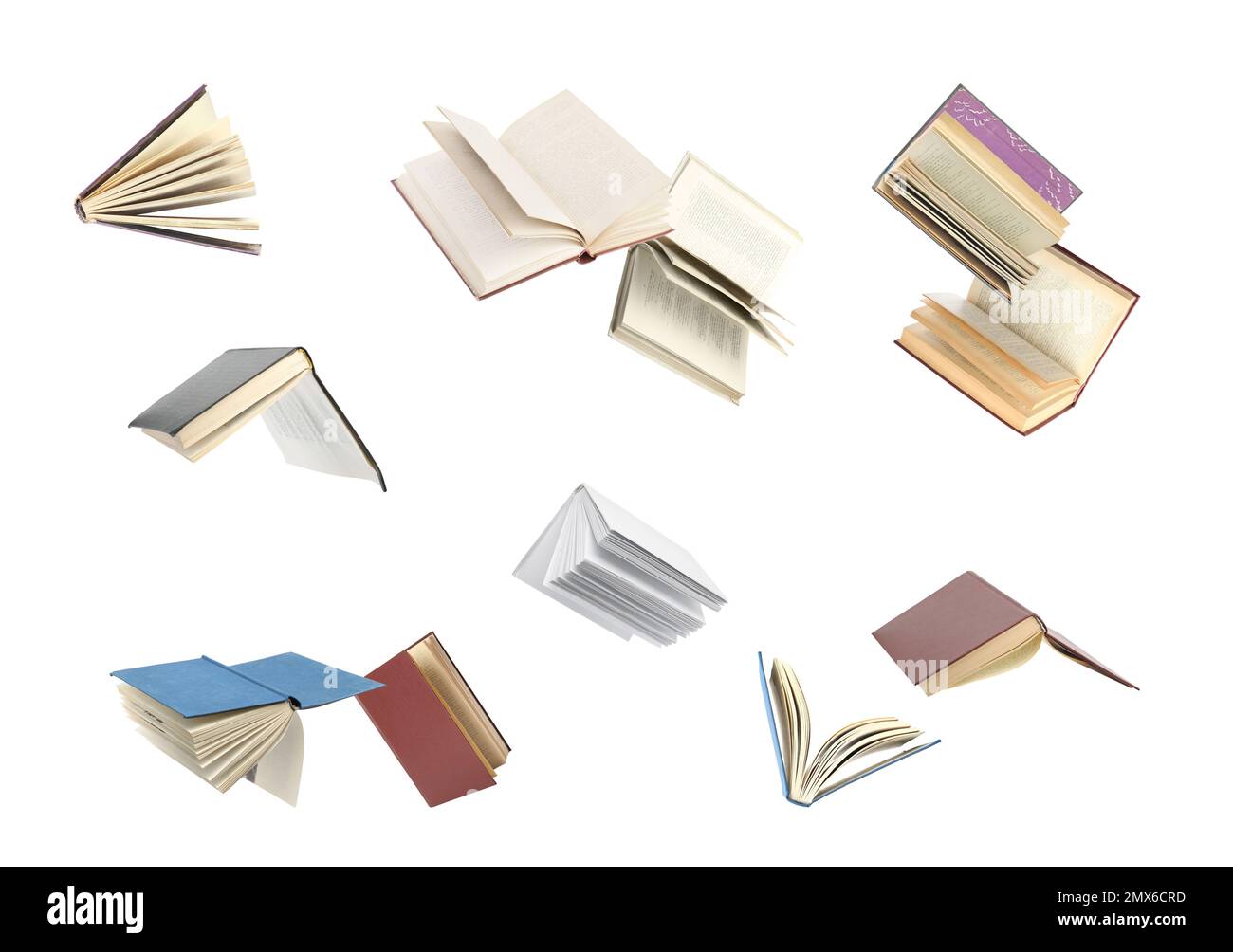 Old hardcover books flying on white background Stock Photo - Alamy