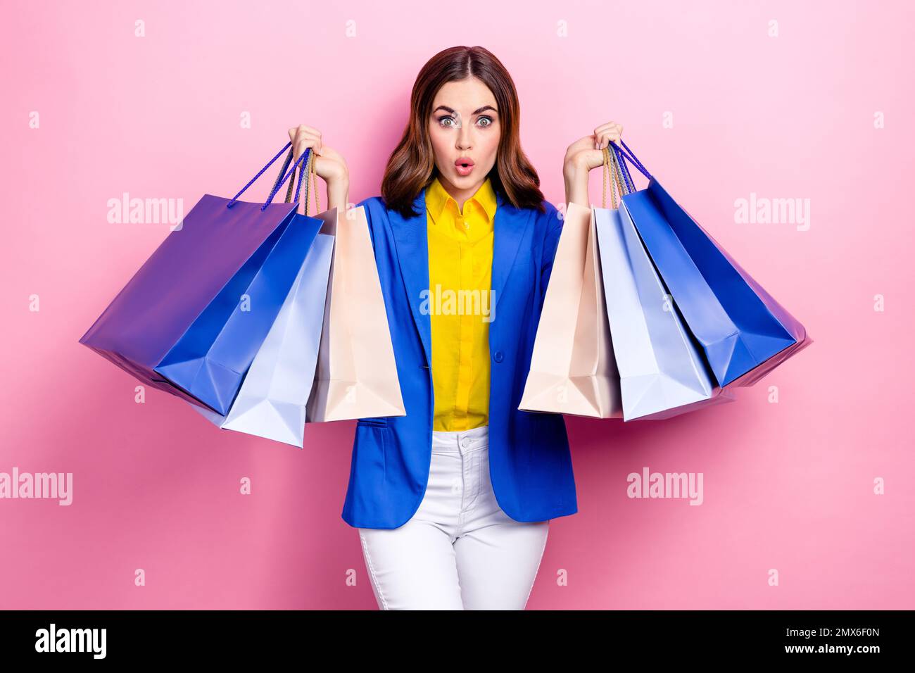 Photo of astonished impressed stunning lady hold many packs spend ...