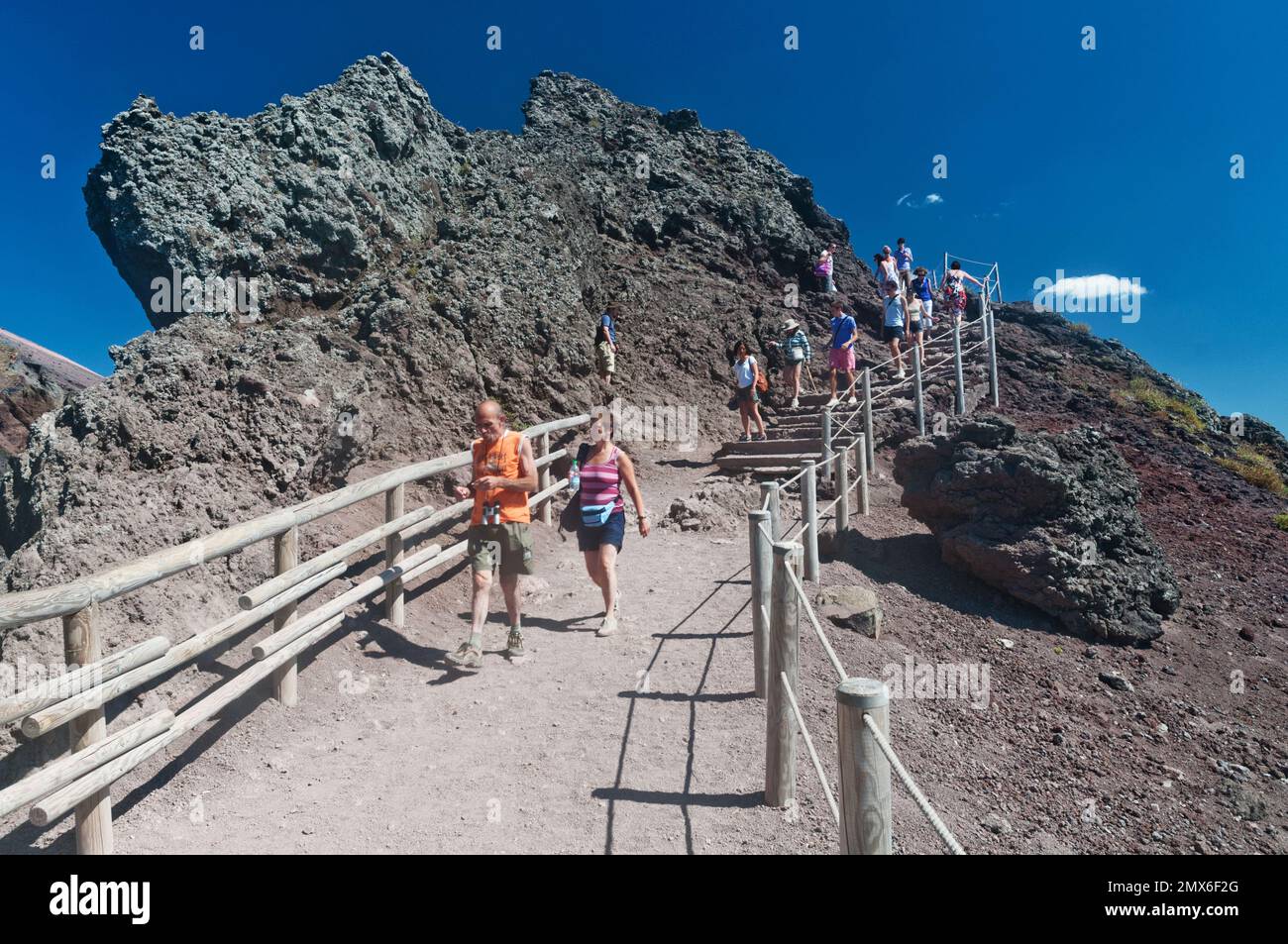 Tourists walking on volcano Mount Vesuvius, in Naples, Italy Stock ...