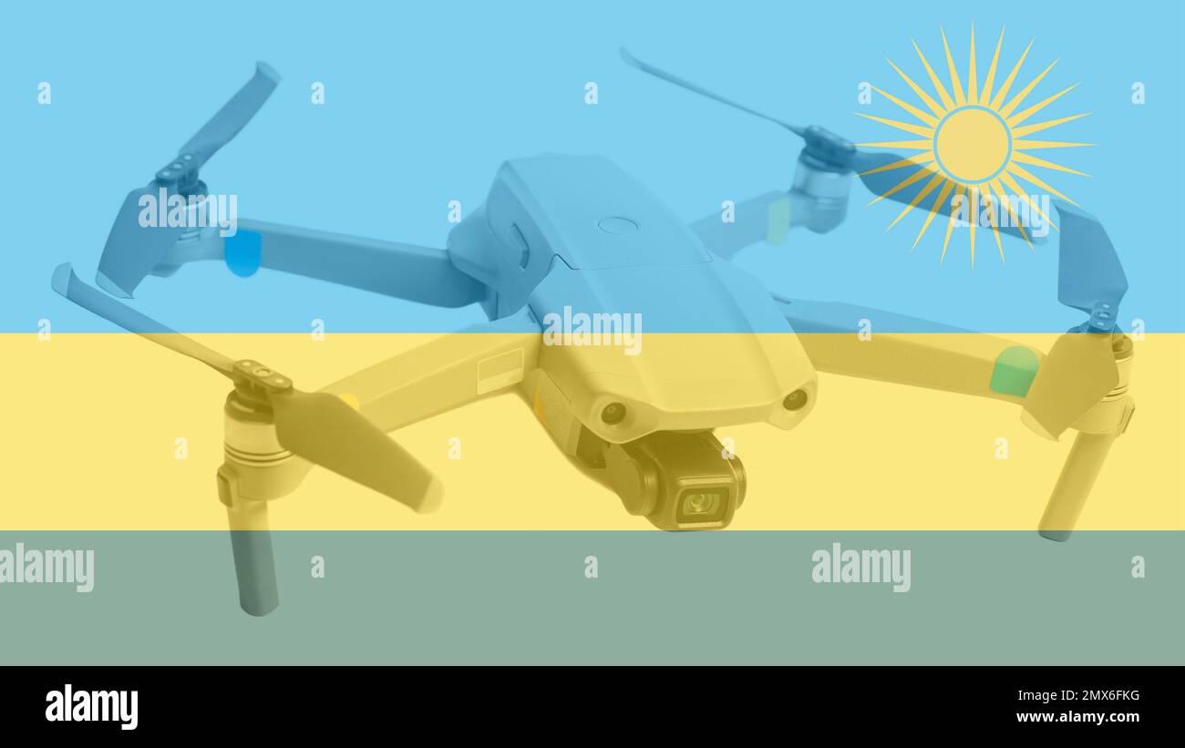 rwanda flag and quadcopter drone aerial camera Stock Photo - Alamy