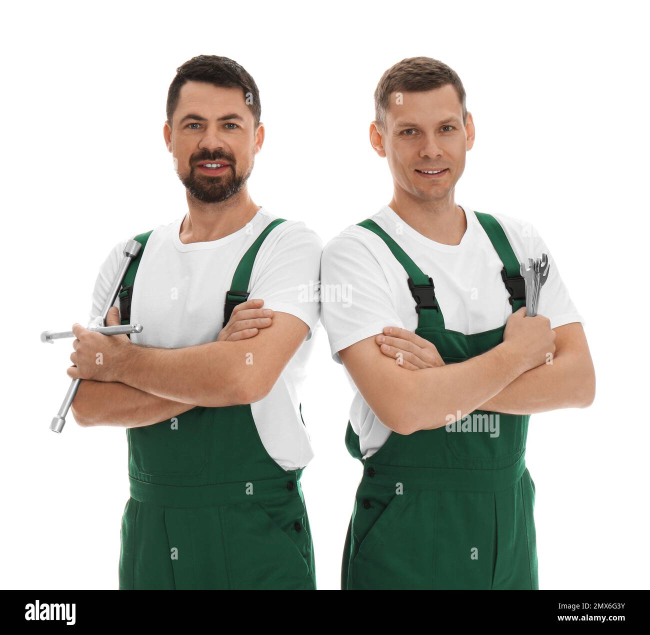 Portrait of professional auto mechanics on white background Stock Photo ...