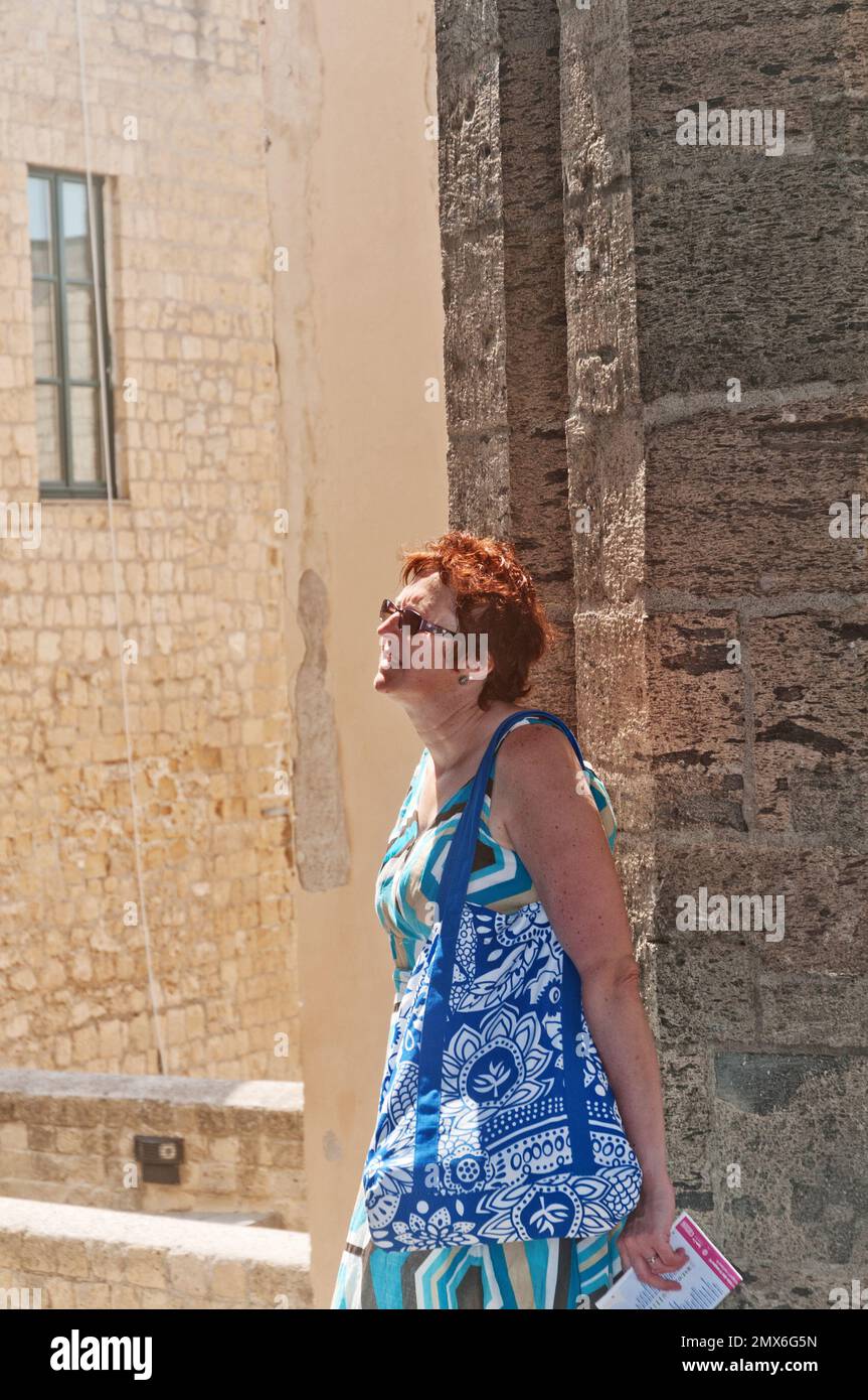Woman tourist looking up in the Castel dell'Ovo Naples, Italy Stock ...