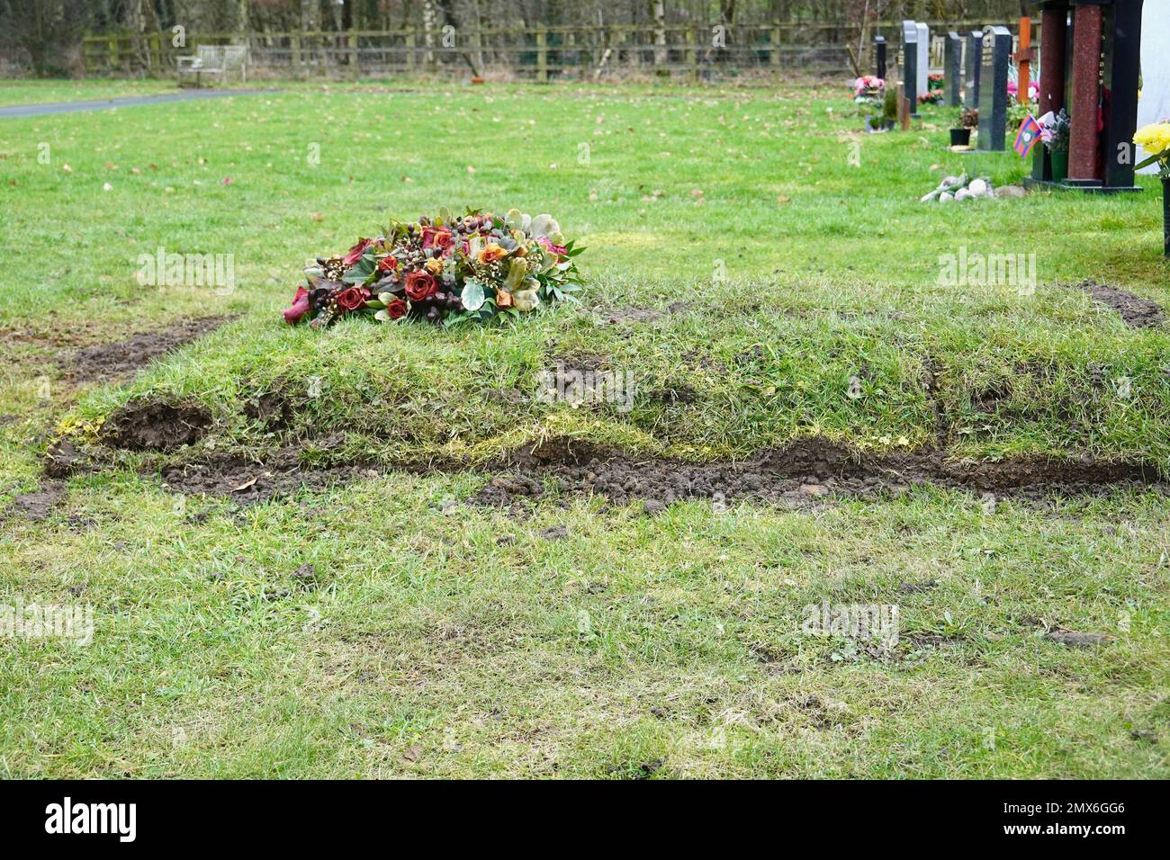 A newly dug grave in a cemetery hi-res stock photography and images - Alamy