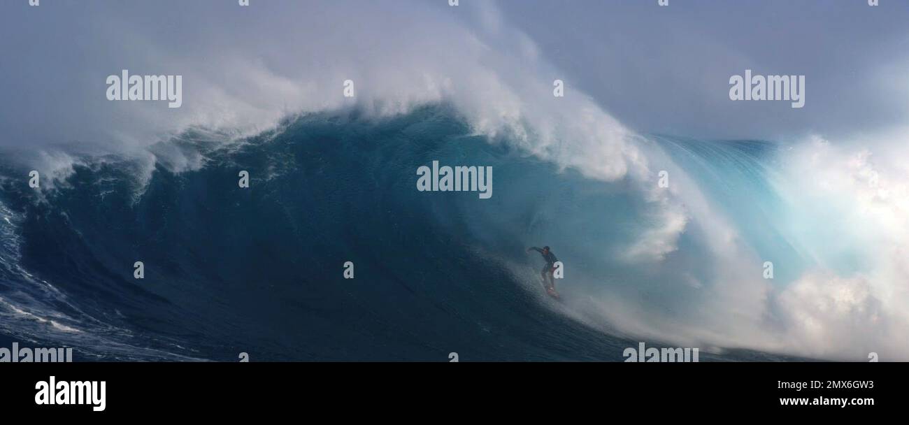 GROUND SWELL: THE OTHER SIDE OF FEAR, a surfer maneuvers a big wave ...