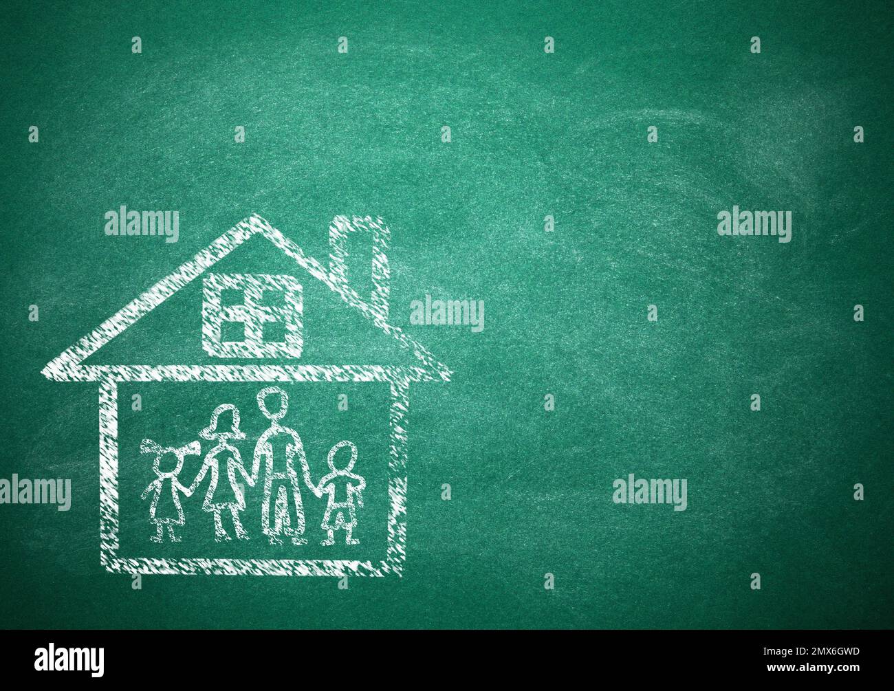 Family in house drawn with chalk on school board Stock Photo - Alamy