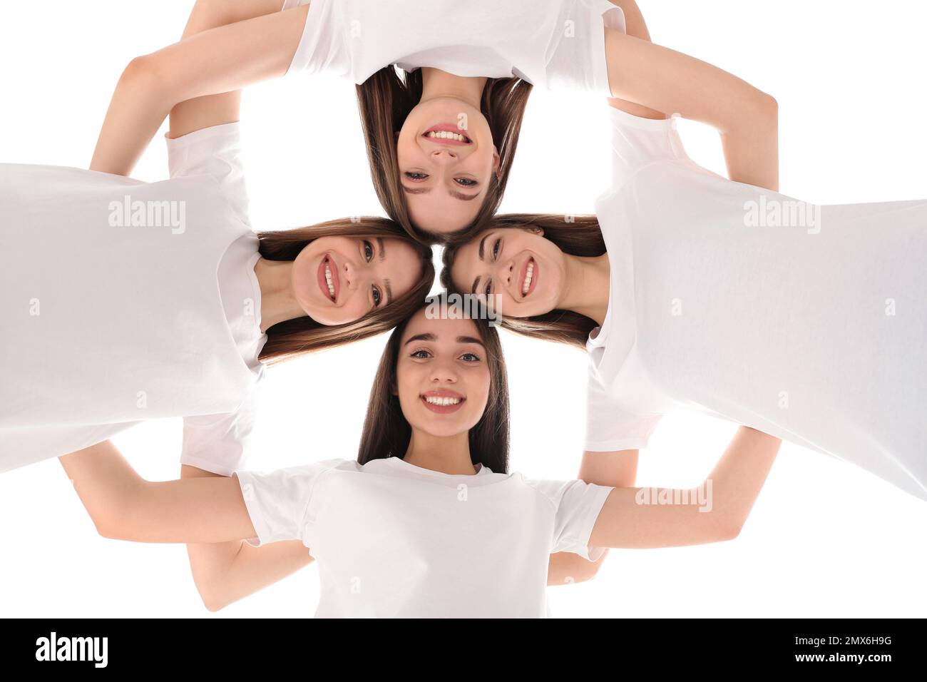 Beautiful young ladies hugging, bottom view. Woman's Day Stock Photo ...