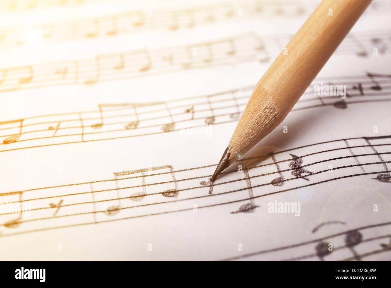 Sheet with music notes and pencil as background, closeup Stock Photo ...