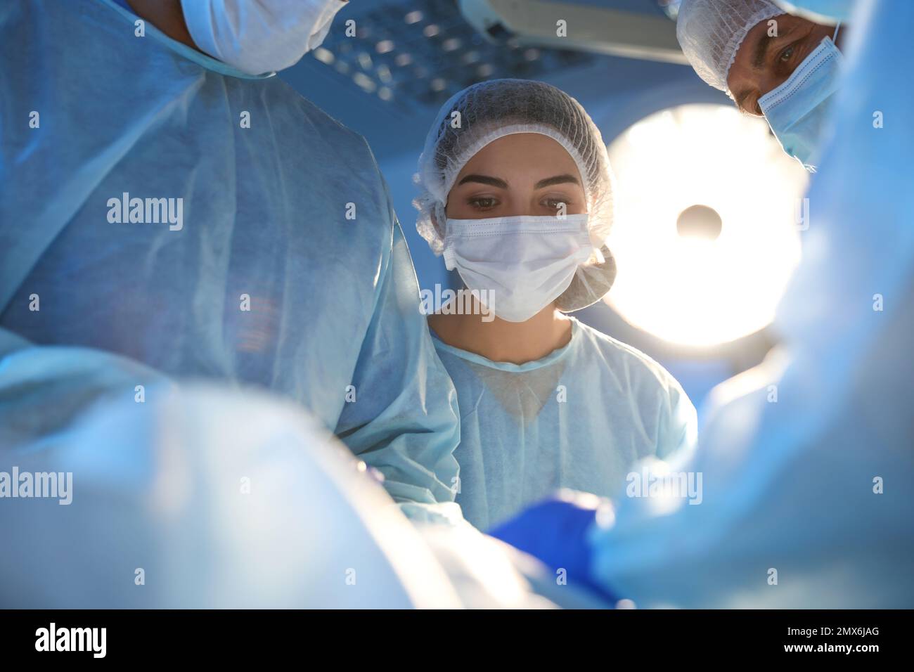 Surgeons performing an operation hi-res stock photography and images ...