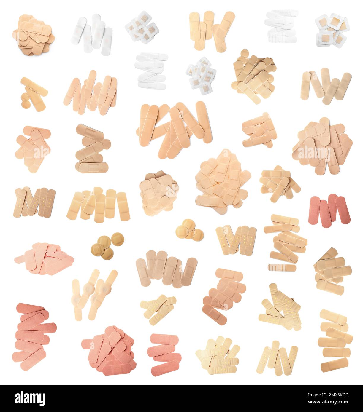 Set with different sticking plasters on white background, top view ...