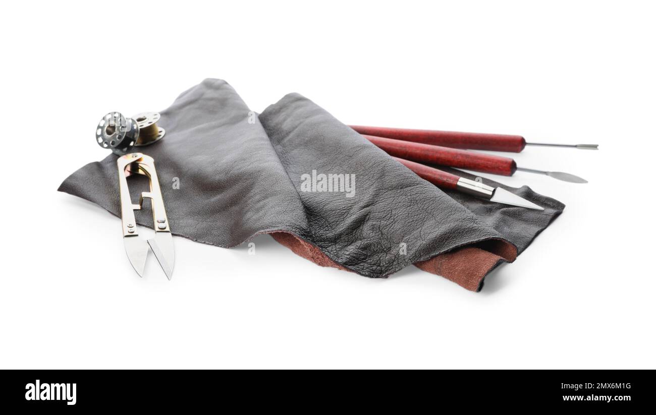 Leather sample and craftsman tools isolated on white Stock Photo - Alamy