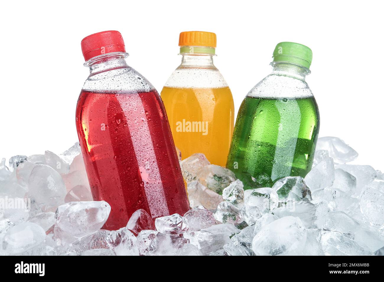 Ice cubes and different soda drinks on white background Stock Photo - Alamy