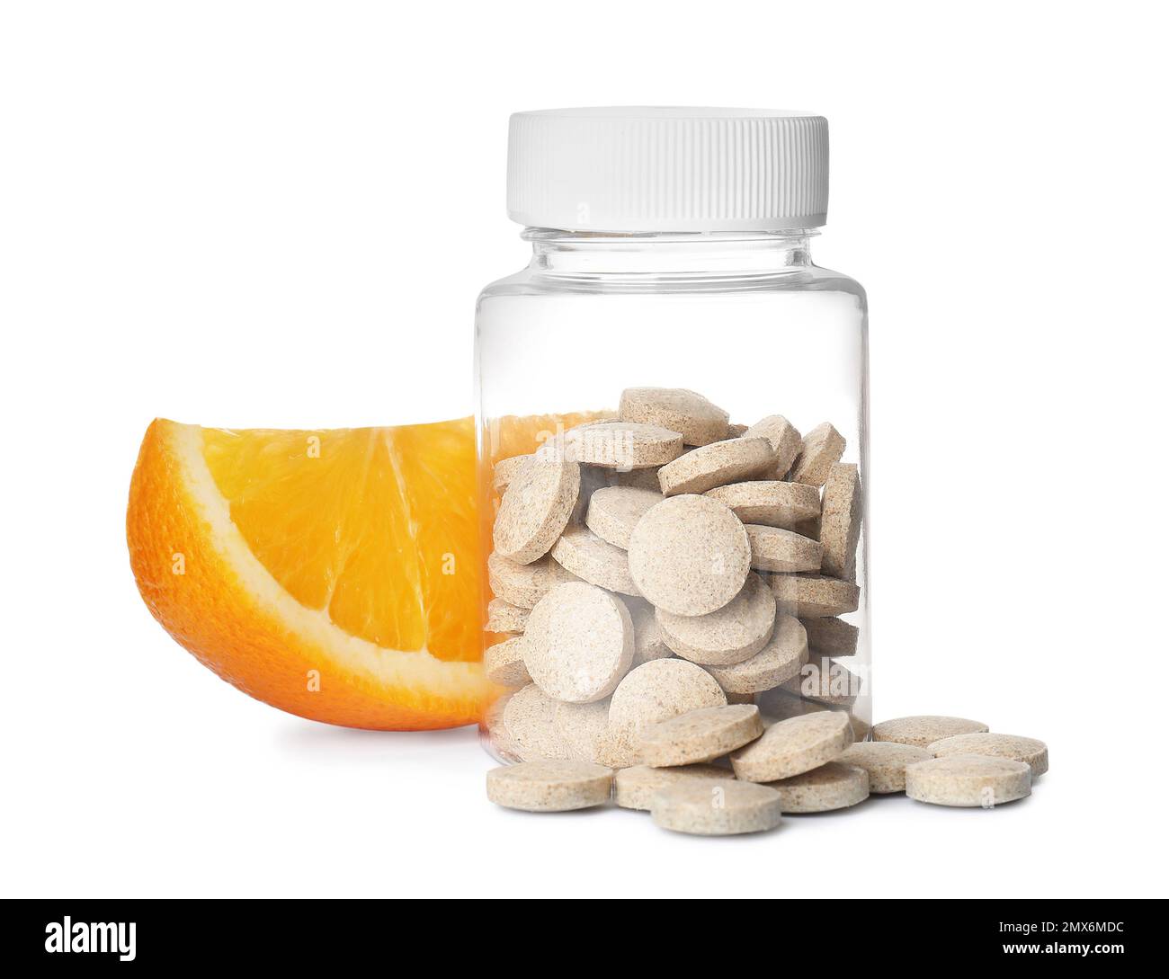 Bottle with vitamin pills and orange on white background Stock Photo ...