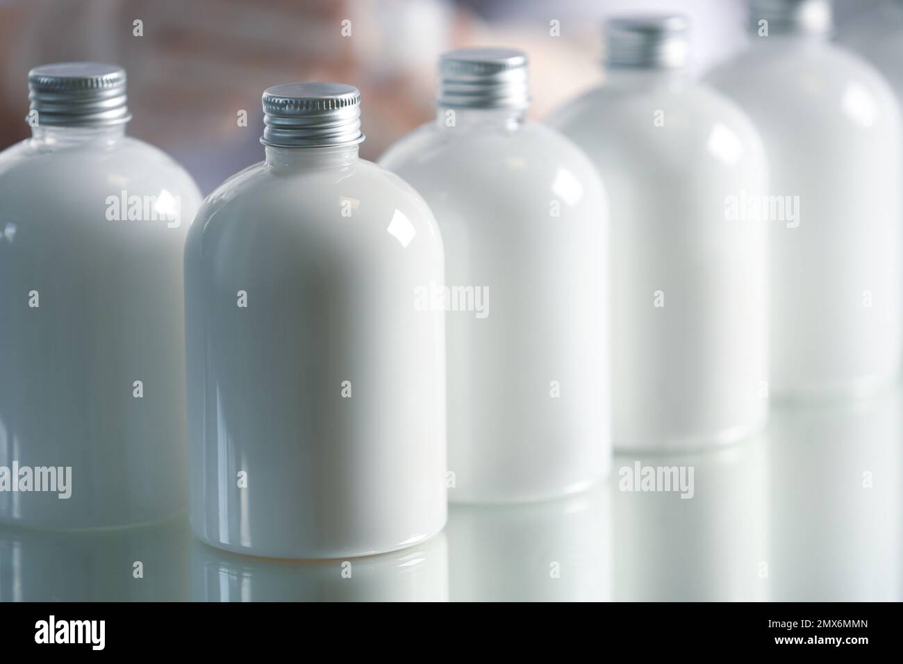 Many bottles with cosmetic product in laboratory Stock Photo - Alamy