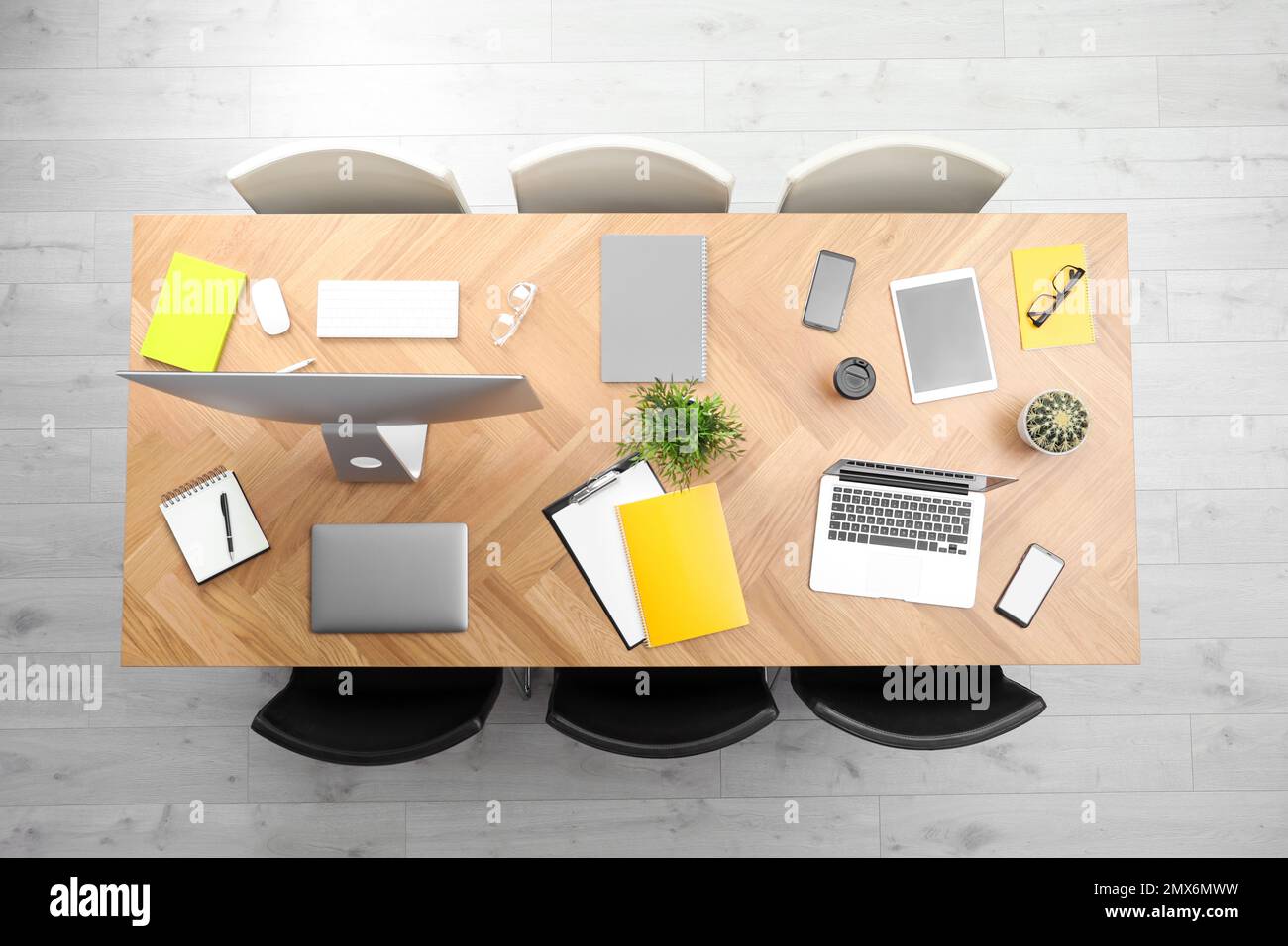 Modern office table with devices and chairs, top view Stock Photo - Alamy