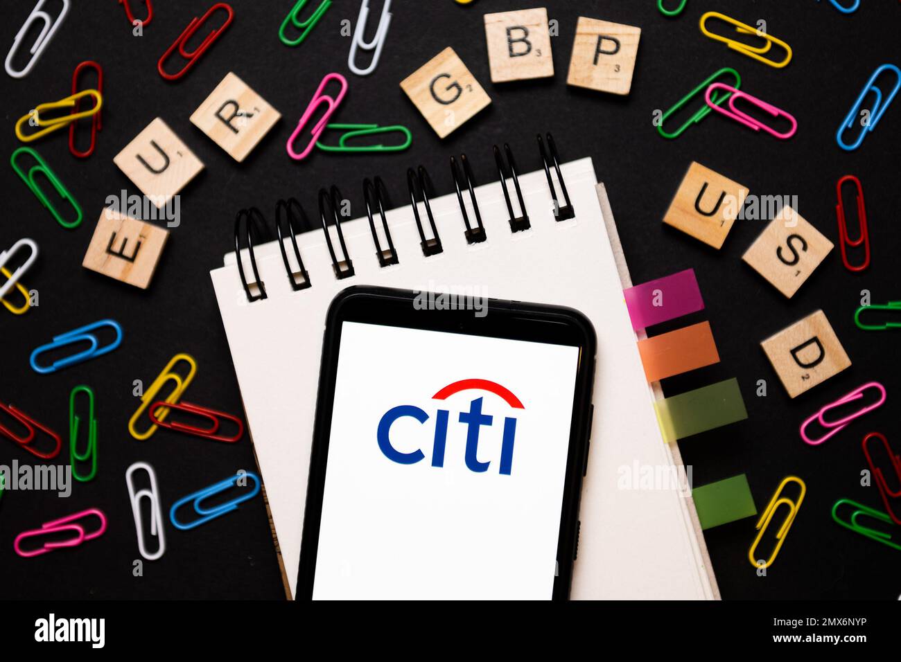 In this photo illustration a Citi Bank logo seen displayed on a ...