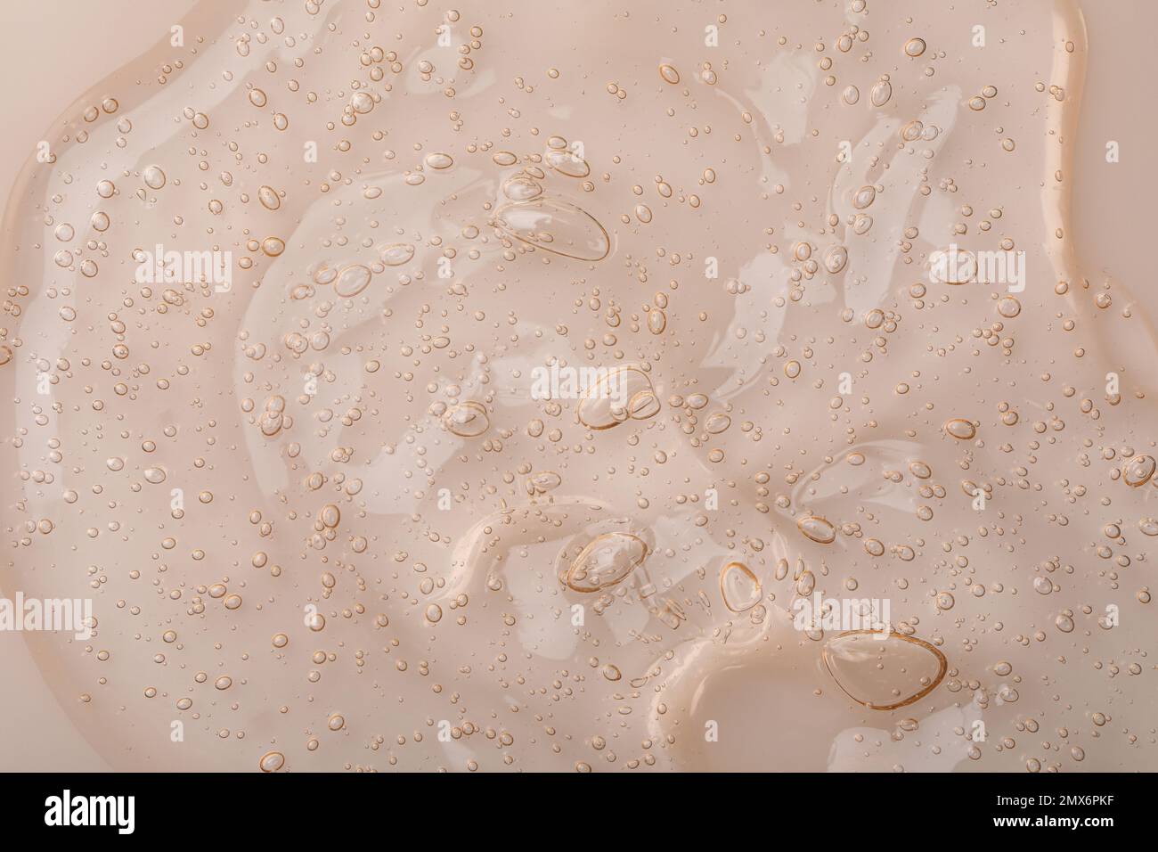 Pure transparent cosmetic gel on beige background, closeup Stock Photo ...