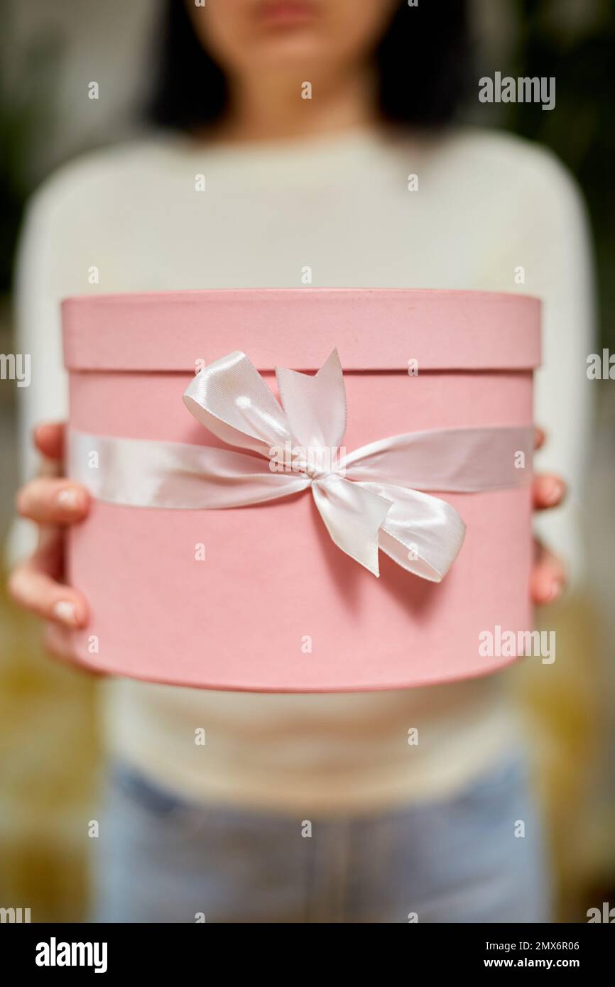 Female holding ribbon hi-res stock photography and images - Alamy