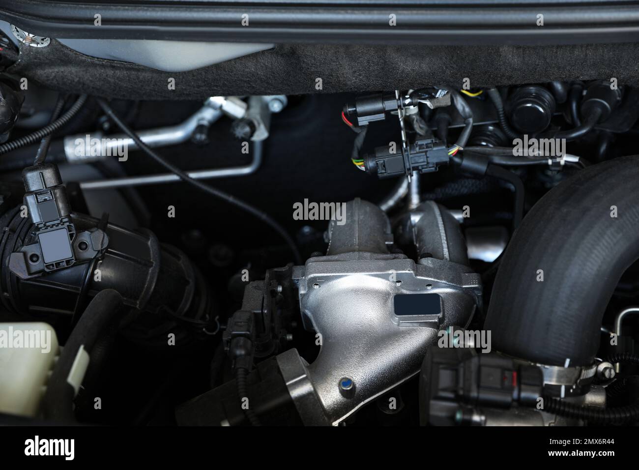 Closeup view of engine bay in modern auto Stock Photo - Alamy