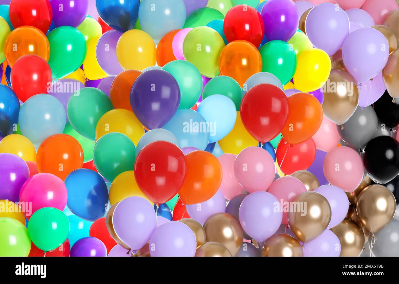 Different color balloons as background. Party decor Stock Photo - Alamy