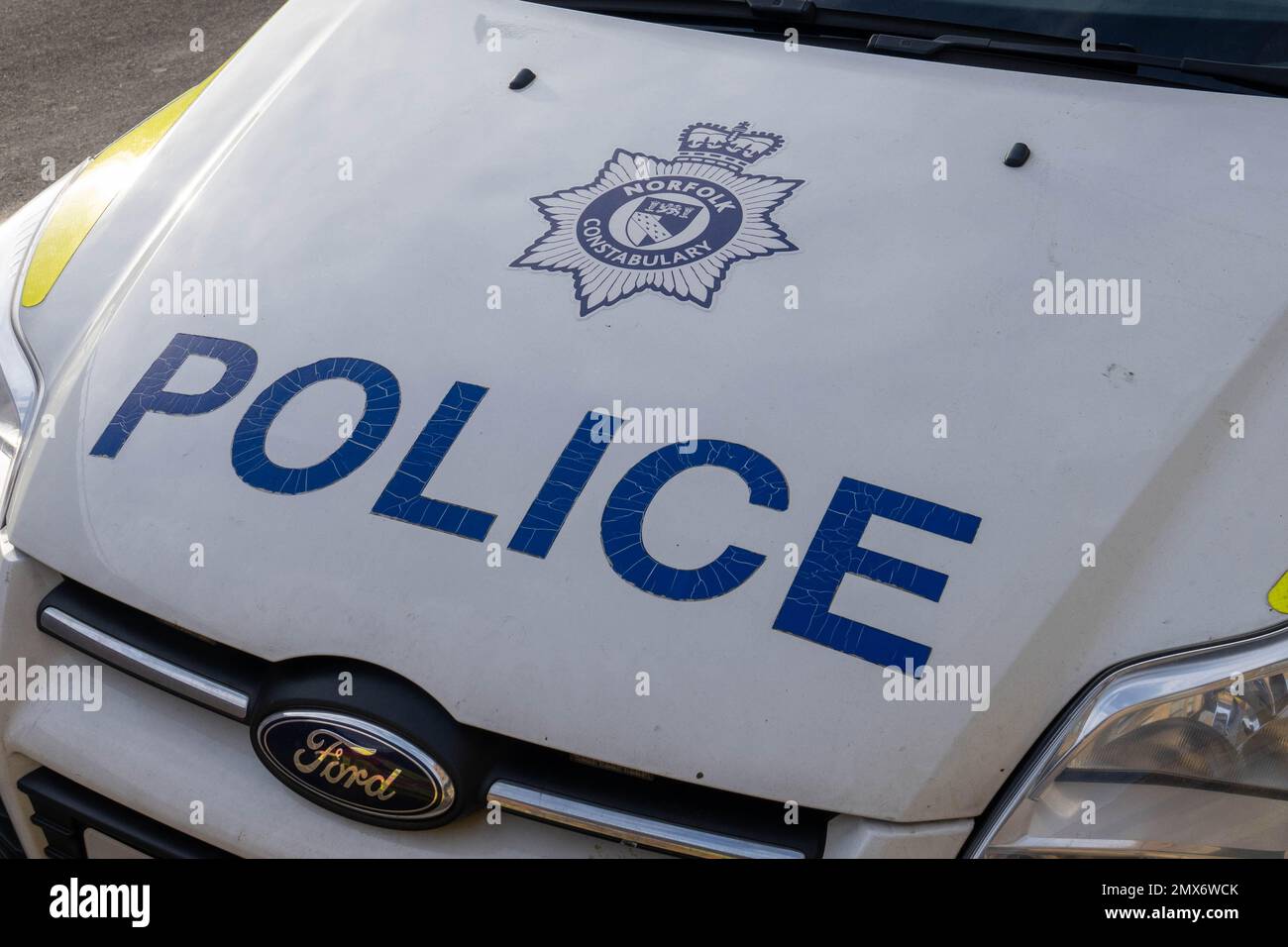 Norfolk Police badge with the words POLICE written on a police car in ...