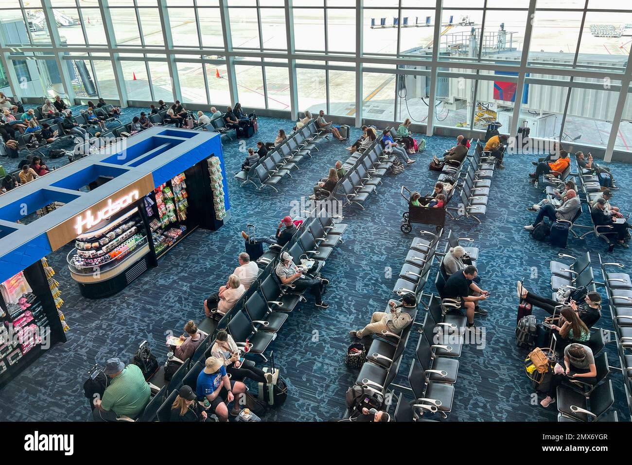 Passengers wait at Terminal 2 at Fort Lauderdale–Hollywood ...