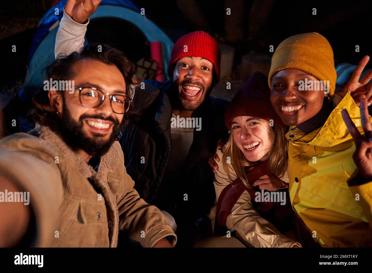 POV of man taking a selfie with diverse group of friends, outdoors ...