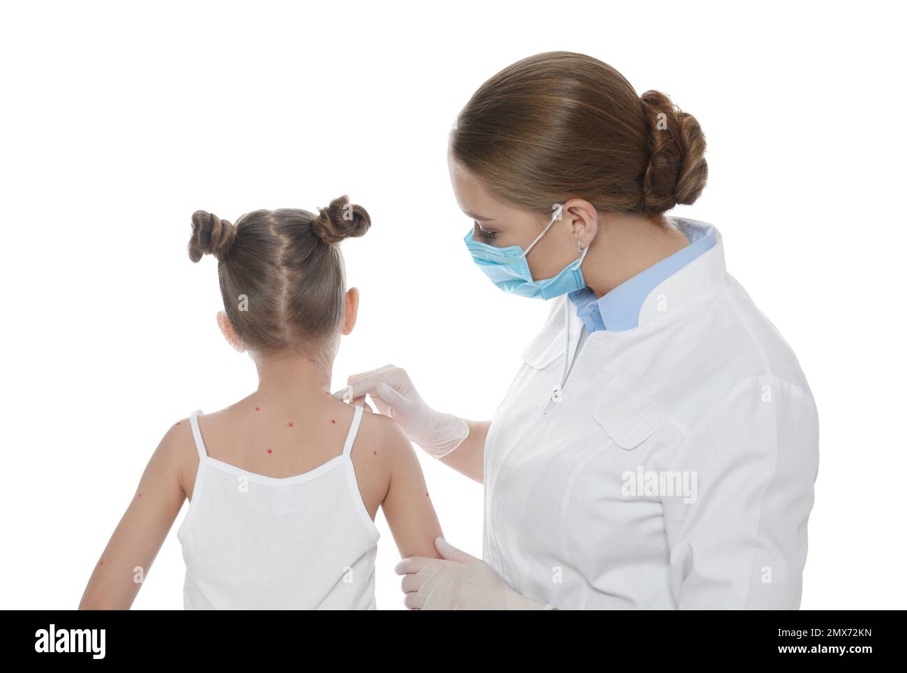 Doctor examining little girl with chickenpox on white background ...