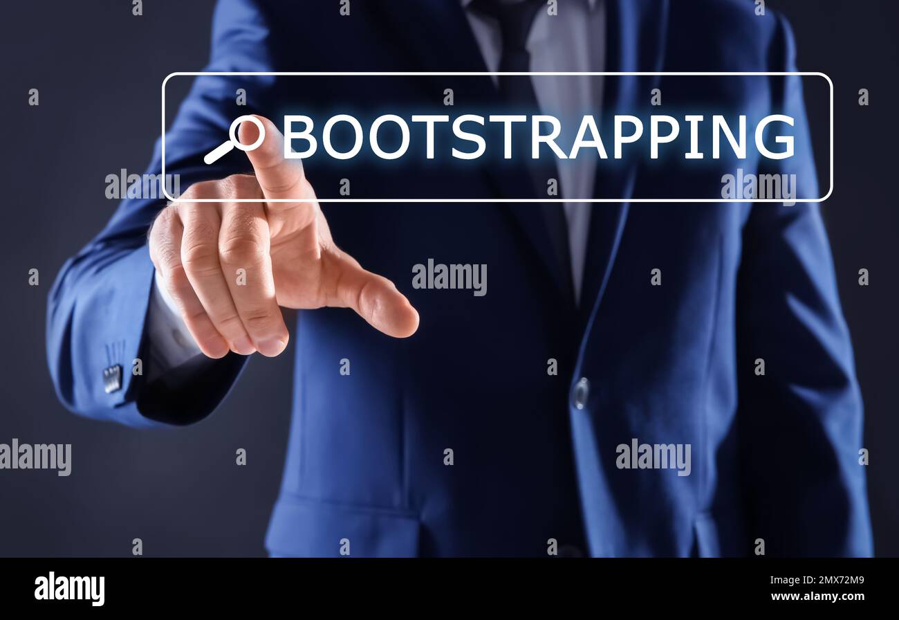 Businessman touching virtual screen with word BOOTSTRAPPING in search ...